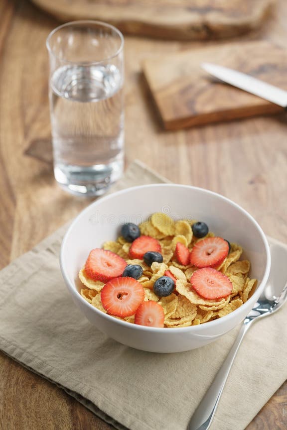 Dry Corn Flakes with Berries in Bowl on Table Stock Image - Image of ...