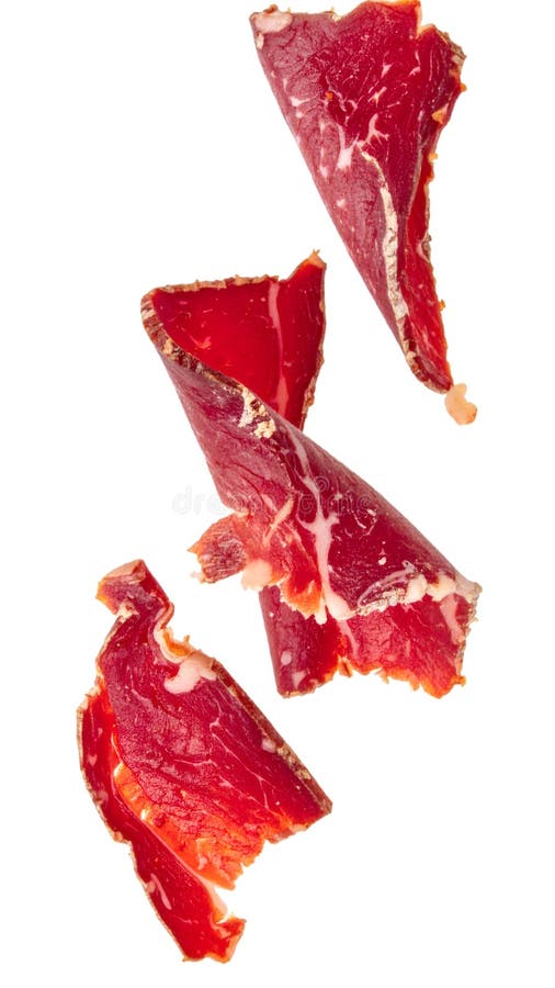 Dry Cured Beef Slices Falling on Transparent Background Stock Photo ...