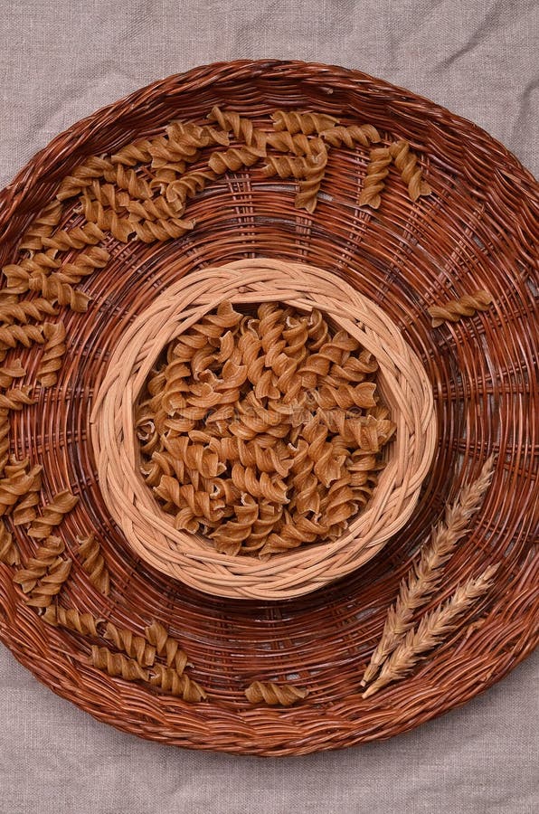 Dry dark brown pasta stock photo. Image of grain, pasta - 285675416