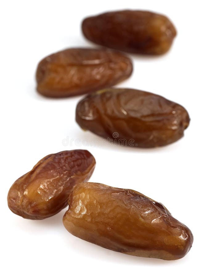 DRY DATE PALM FRUIT Phoenix Dactylifera AGAINST WHITE BACKGROUND Stock ...