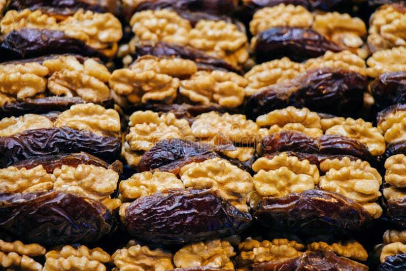 Dry Dates Stuffed with Walnuts on Display Stock Photo - Image of fruit ...