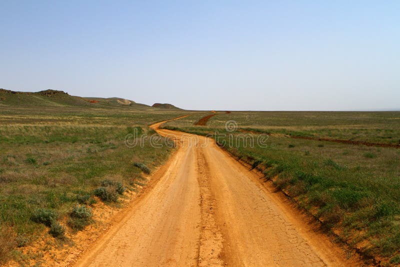 Dry dirt road in steppe stock photo. Image of outdoor - 92762554