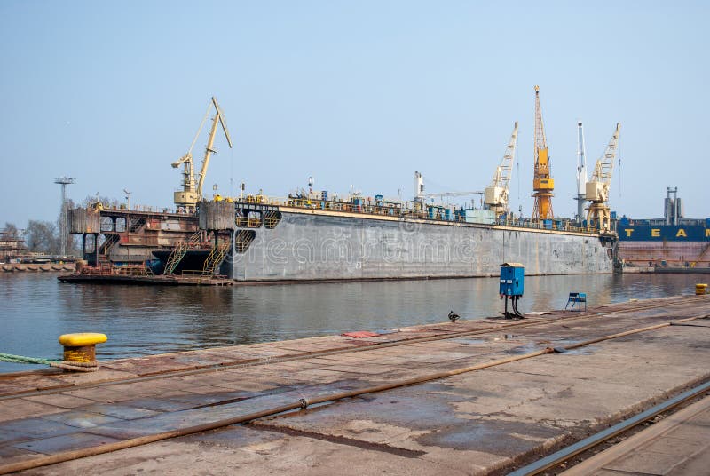 Dry Dock with Cranes at a Shipyard Stock Photo - Image of maintenance ...