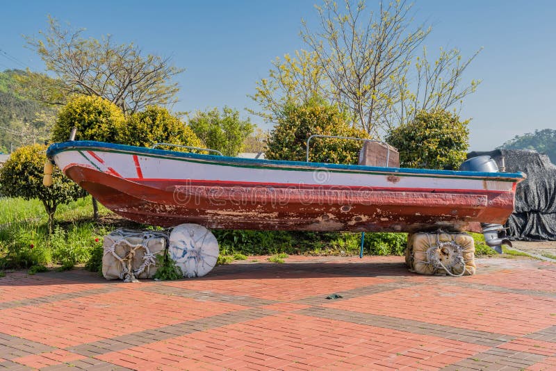 Dry Docked Fishing Boat with Outboard Engine Stock Photo - Image of ...