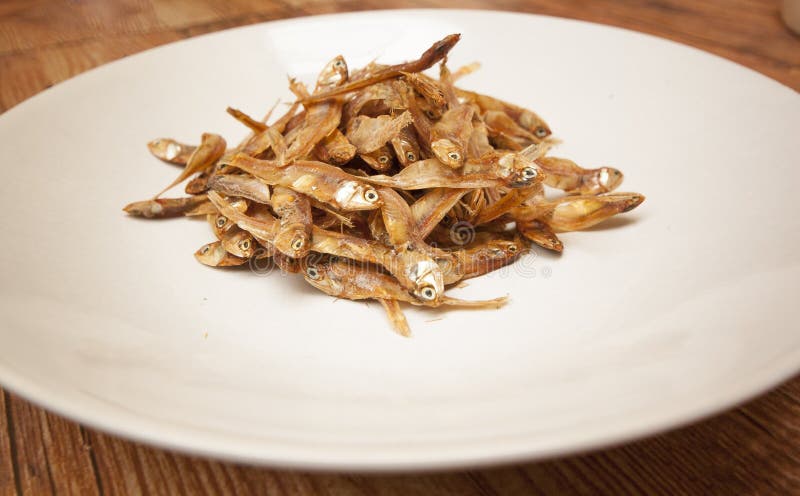 Dry fish on dish stock image. Image of template, table - 104000537