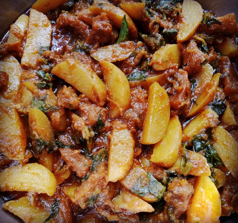 Dry Fish with Potatoes, Coriander and Indian Spice Stock Image - Image ...