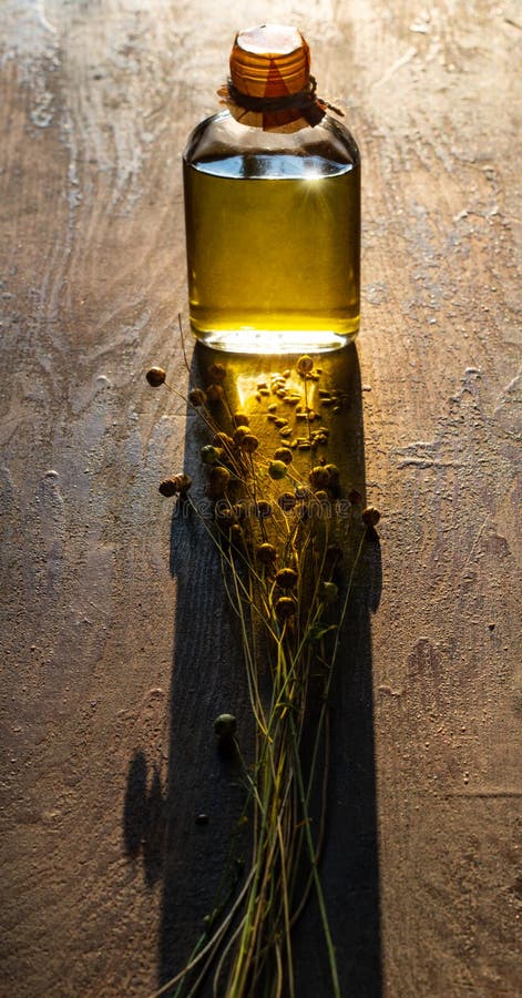 Dry Flaxseed Capsules and Linseed Oil Bottle Stock Photo - Image of ...