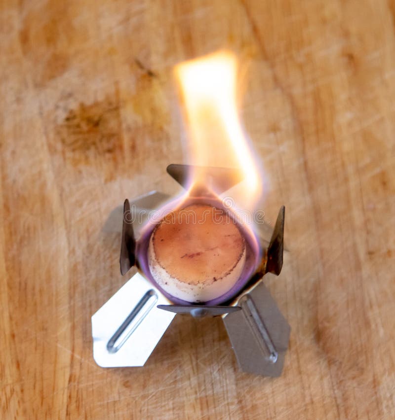 A Dry Fuel Tablet Burns on a Table Stock Photo - Image of chemistry ...