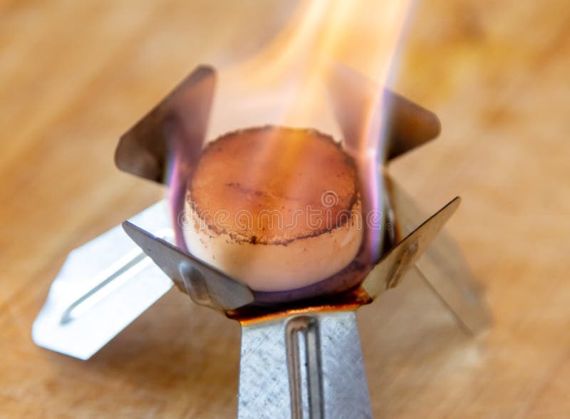 A Dry Fuel Tablet Burns on a Table Stock Photo - Image of pharaoh ...