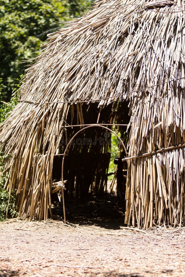 A dry grass hut entrance stock image. Image of sahara - 56666015