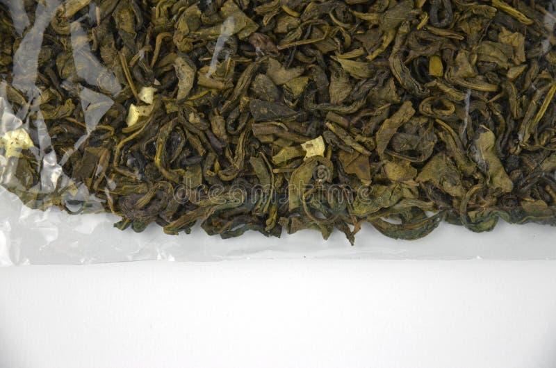 Dry Green Leaf Tea in a Transparent Plastic Bag (package) Closeup Stock ...