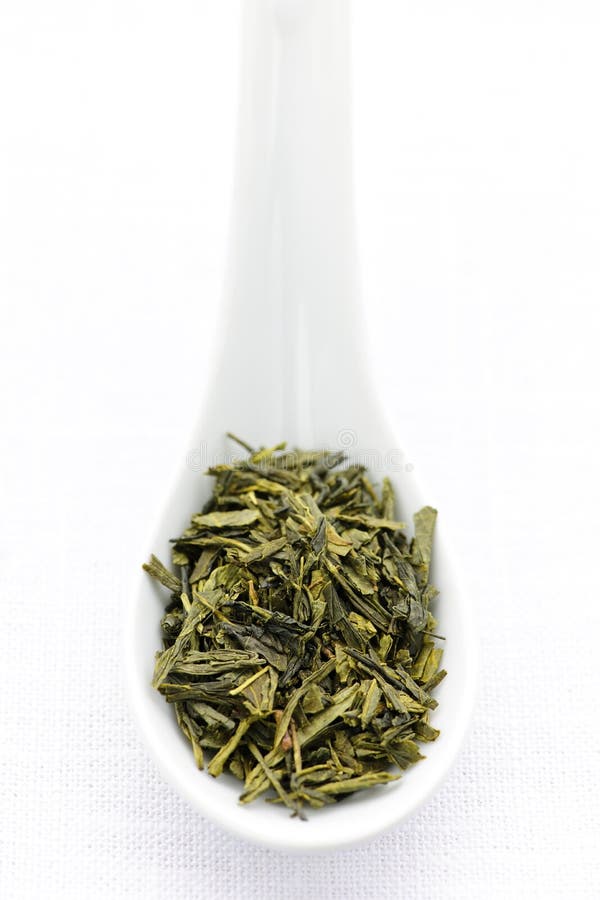 Dry Green Tea Leaves in a Spoon Stock Photo - Image of brew, porcelain ...