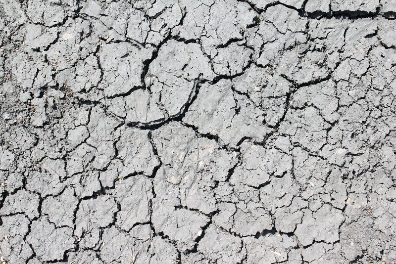 Dry Ground with Gray Cracks Stock Image - Image of arid, surface: 155576027
