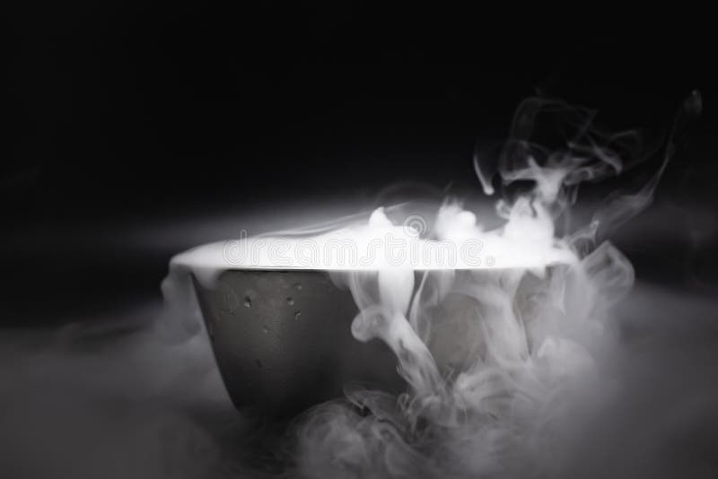 Dry ice smoke on cup stock photo. Image of bowl, concept - 162411474