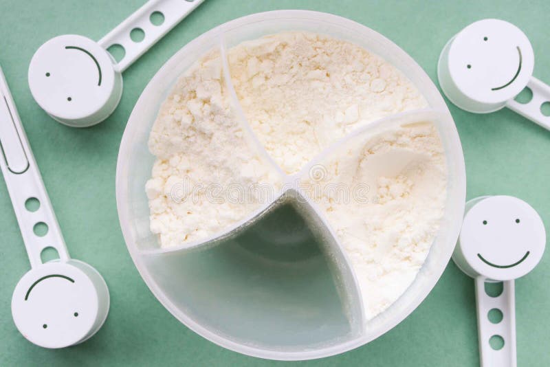 Dry Infant Formula in Container and Spoon. Baby Spoons and Container ...