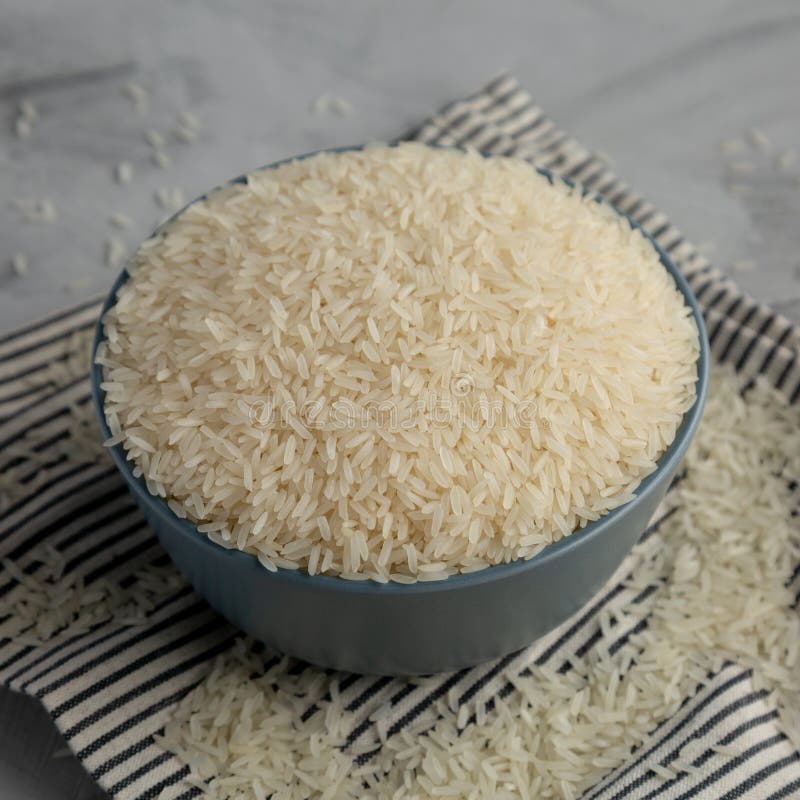 Dry Jasmine Rice in a Bowl, Side View Stock Photo - Image of cooking ...