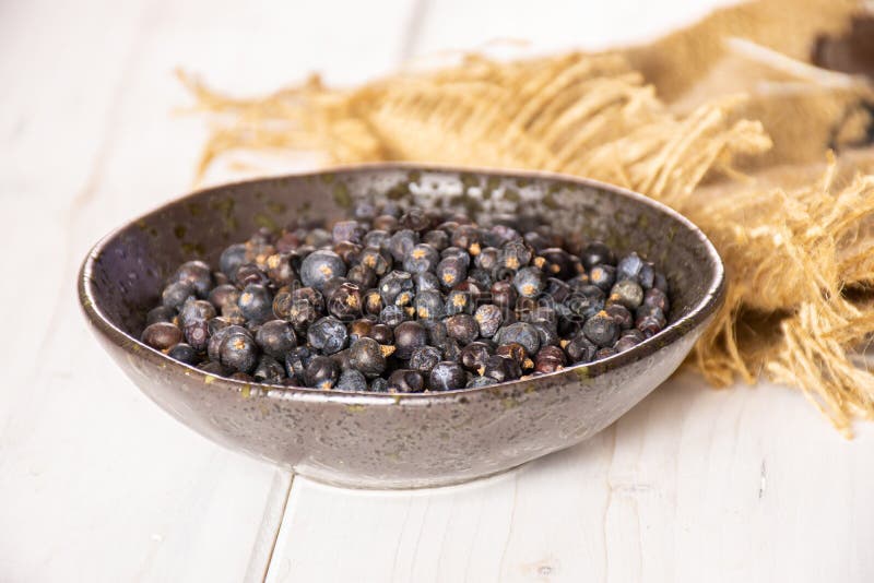 Dry Juniper Berries on Grey Wood Stock Photo - Image of cone, bitter ...