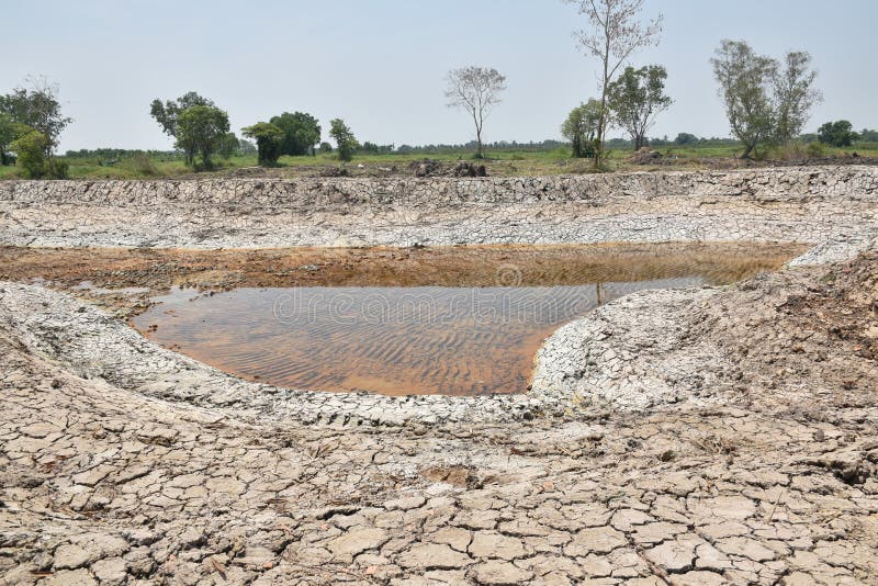 Dry Land on Paddy Filled and Pool with less Water in Summer Stock Photo ...