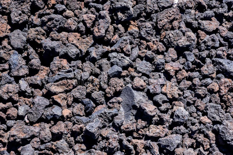 Basaltic Rock Structure among Red Volcanic Soil Stock Photo - Image of ...
