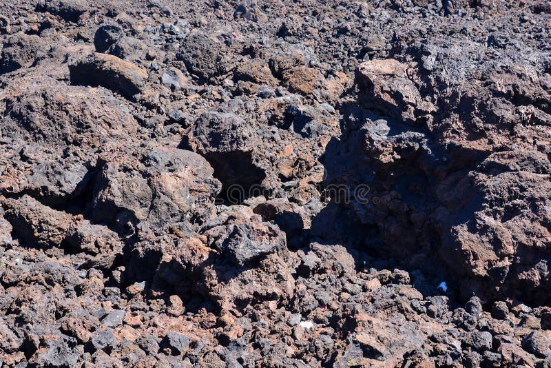 Basaltic Rock Structure among Red Volcanic Soil Stock Photo - Image of ...