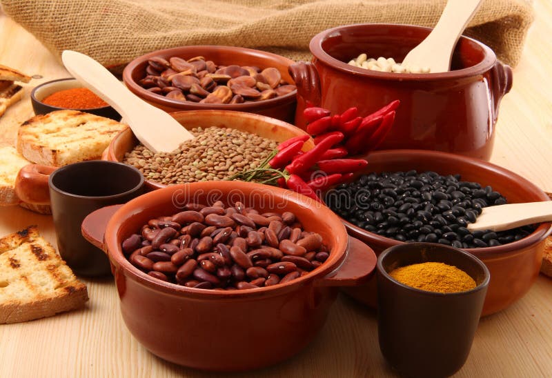 Dry legumes in rustic dish stock image. Image of white - 105519261