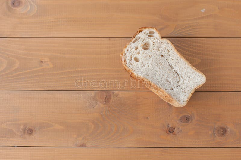 A Dry Loaf of Bread on a Wooden Table. Old Food Stock Image - Image of ...