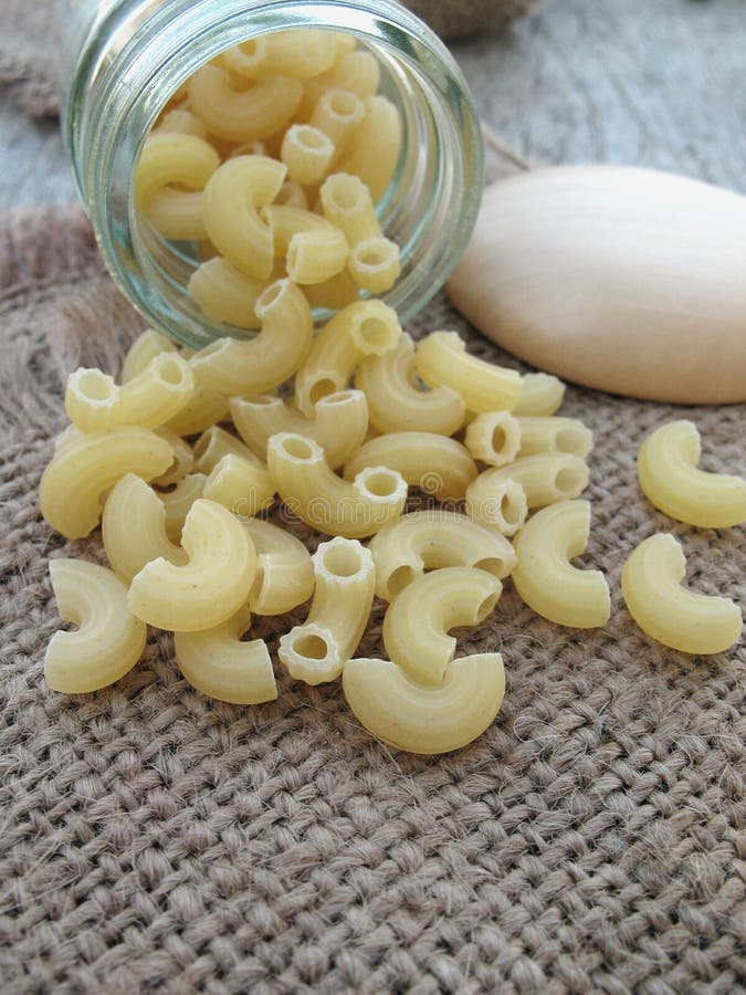 Dry Magaroni and Glass Bottle,spread Stock Image - Image of magaroni ...