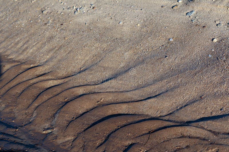 Dry Mud and Sand with Beautiful Wavy Patterns and Light Shadows Stock ...