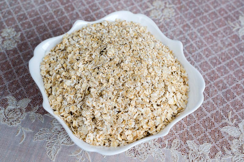 Dry Oatmeal in a Plate on Table Stock Photo - Image of food ...