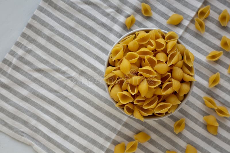 Dry Organic Medium Pasta Shells in a Bowl, Top View. Copy Space Stock ...