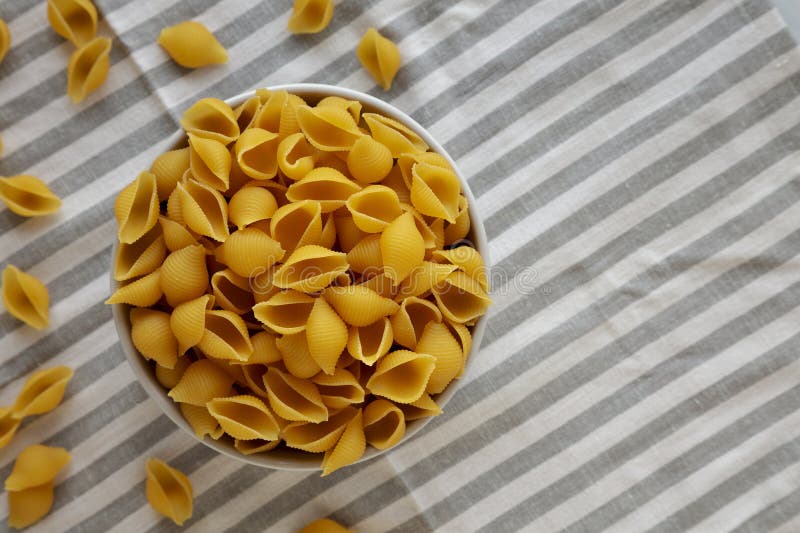 Dry Organic Medium Pasta Shells in a Bowl, Top View. Copy Space Stock ...