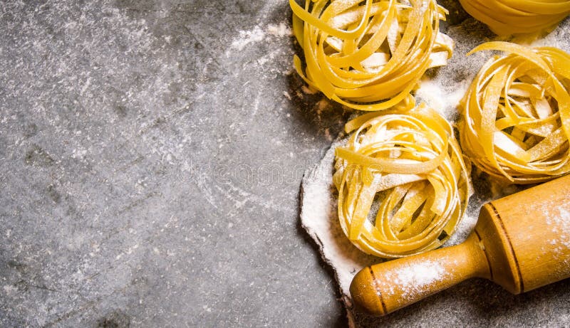 Dry Pasta with a Rolling Pin and Flour. Stock Image - Image of rolling ...