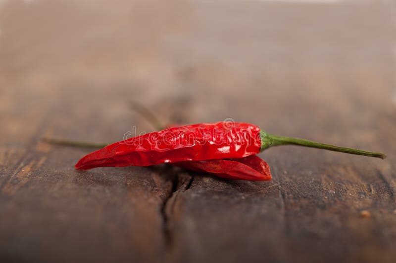 Dry red chili peppers stock image. Image of rustic, spice - 39620309