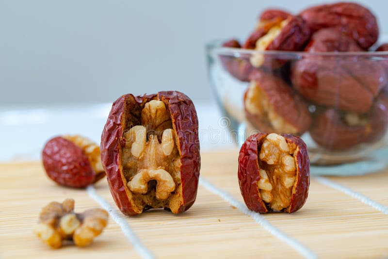 Dry red dates with walnuts stock image. Image of organic - 177937469