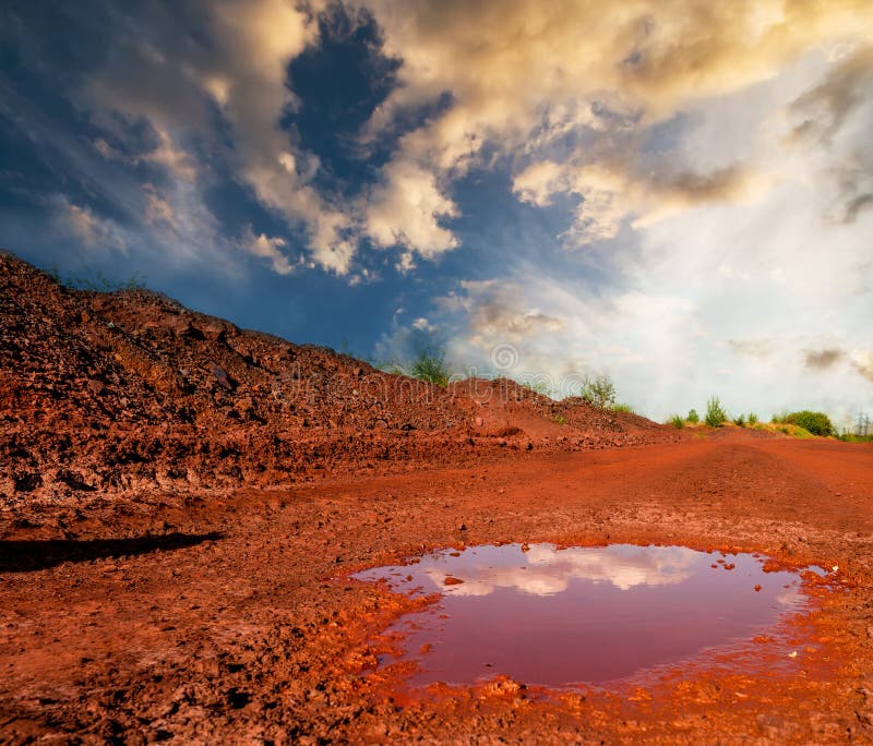 Dry Red Soil with Puddle in Kryvyi Rih, Ukraine Stock Image - Image of ...