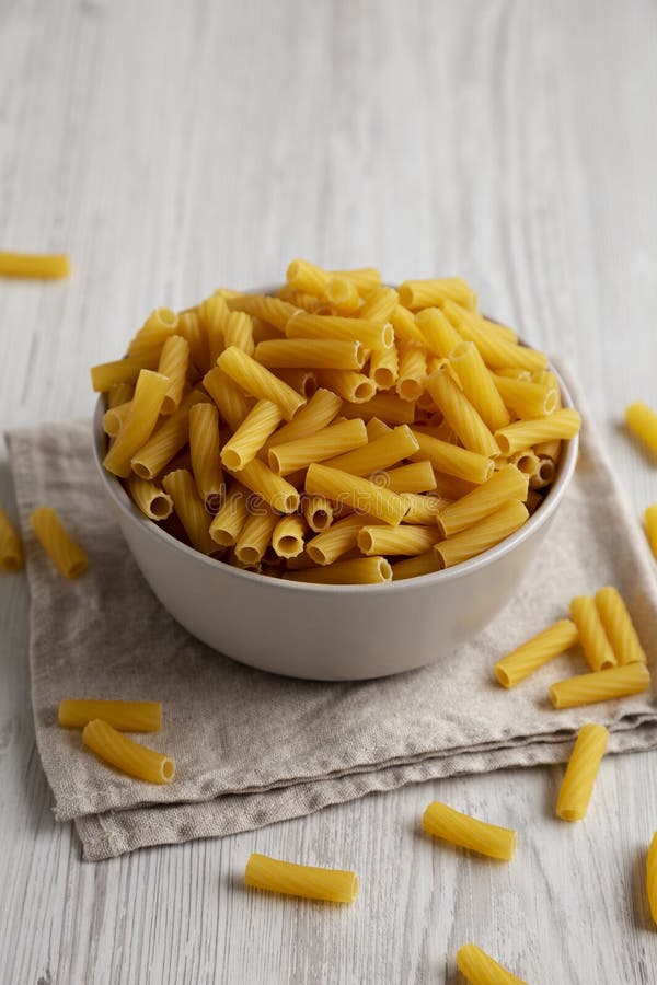 Dry Rigatoni Pasta in a Bowl, Side View Stock Photo - Image of cuisine ...