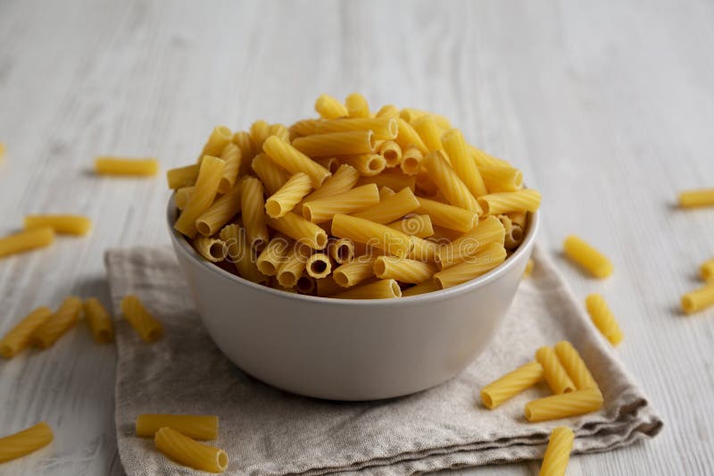 Dry Rigatoni Pasta in a Bowl, Side View Stock Image - Image of ...