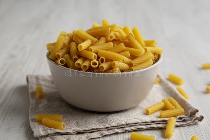 Dry Rigatoni Pasta in a Bowl, Side View Stock Image - Image of ...