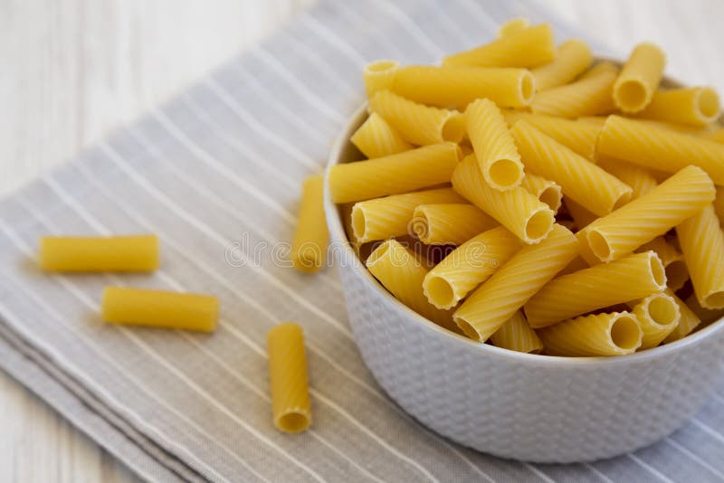 Dry Rigatoni Pasta in a Gray Bowl, Side View. Copy Space Stock Photo ...