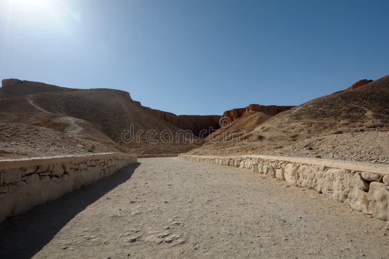 Dry road through desert stock photo. Image of walls, distant - 6652818