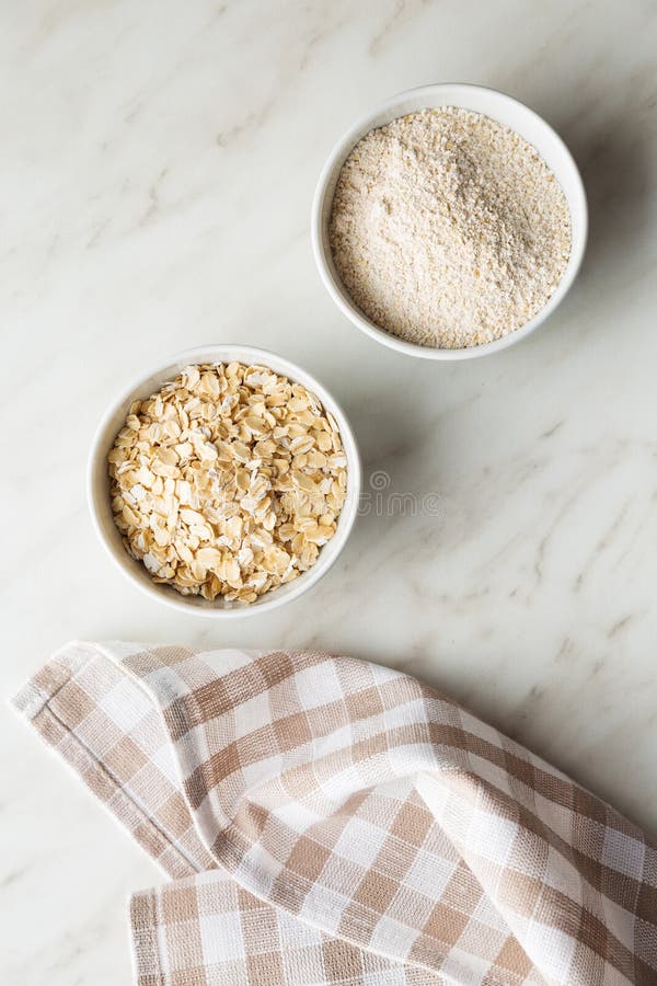 Dry Rolled and Ground Oatmeal. Stock Image - Image of cereal, table ...