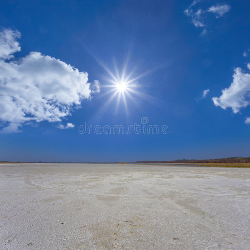 Dry Saline Land Under a Sparkle Sun Stock Image - Image of glow, earth ...