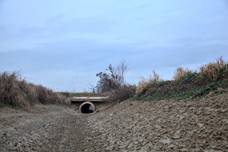 Dry Stream of Water between Fields in the Italian Countryside on a ...