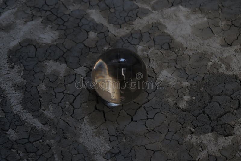 A Dry Surface of Land with Earth Globe Stock Image - Image of crack ...