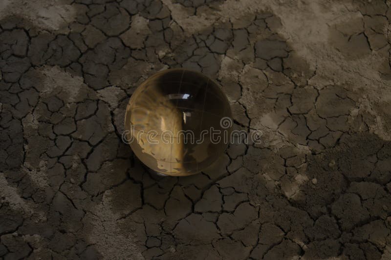 A Dry Surface of Land with Earth Globe Stock Photo - Image of desert ...