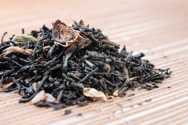 Dry Tea Leaves Spread on Light Brown Color Background Stock Image ...