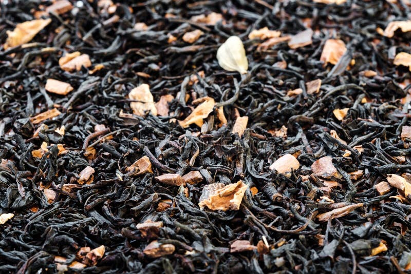 Dry Tea Leaves Spread on Light Brown Color Background Stock Image ...