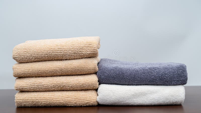 Dry Towels Piled Up on the Wooden Floor Stock Photo - Image of cotton ...