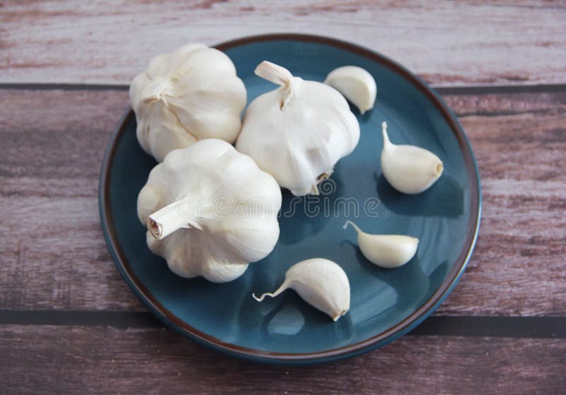 Dry white garlic in slices stock image. Image of dried - 228252221
