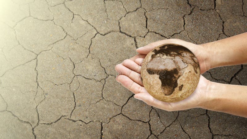 Dry World on Hands on the Dry and Cracked Ground Stock Image - Image of ...